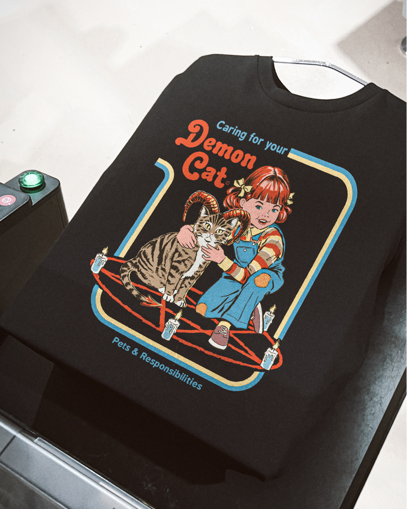 Caring for Your Demon Cat T-Shirt | Official Steven Rhodes Merch | Threadheads